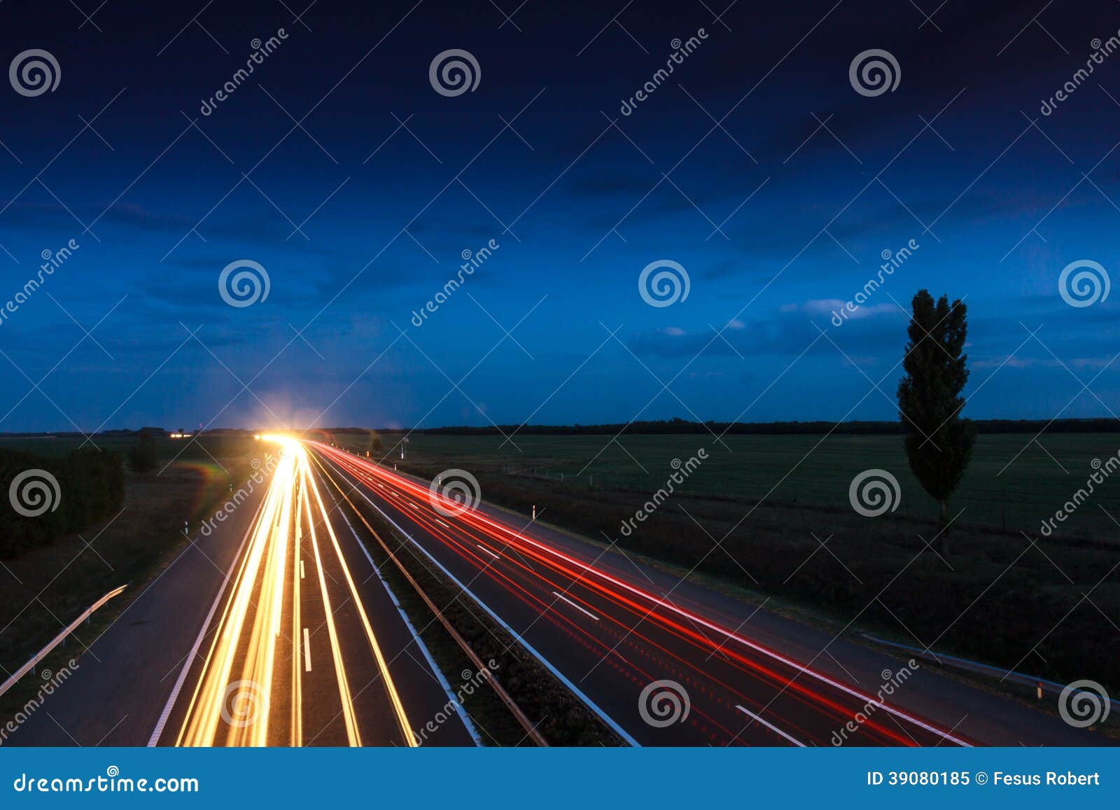 Cars speeding on a highway stock image. Image of exposure - 39080185