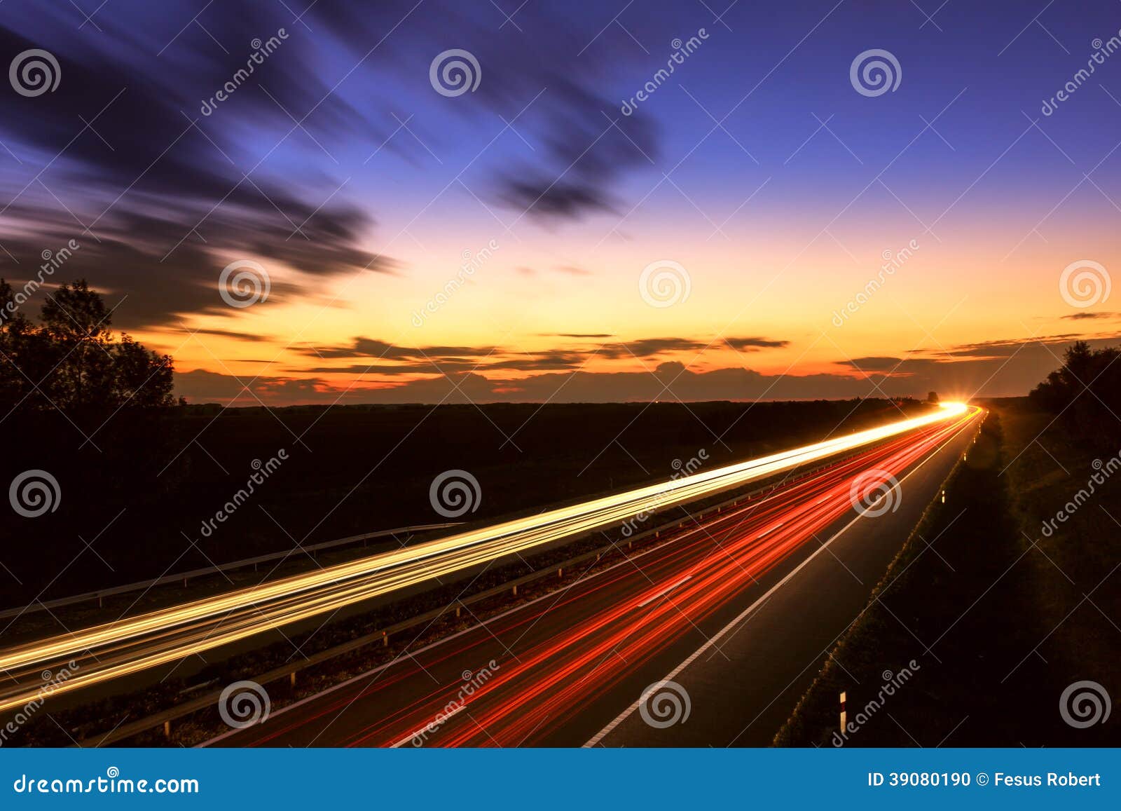 Cars speeding on a highway stock photo. Image of journey - 39080190