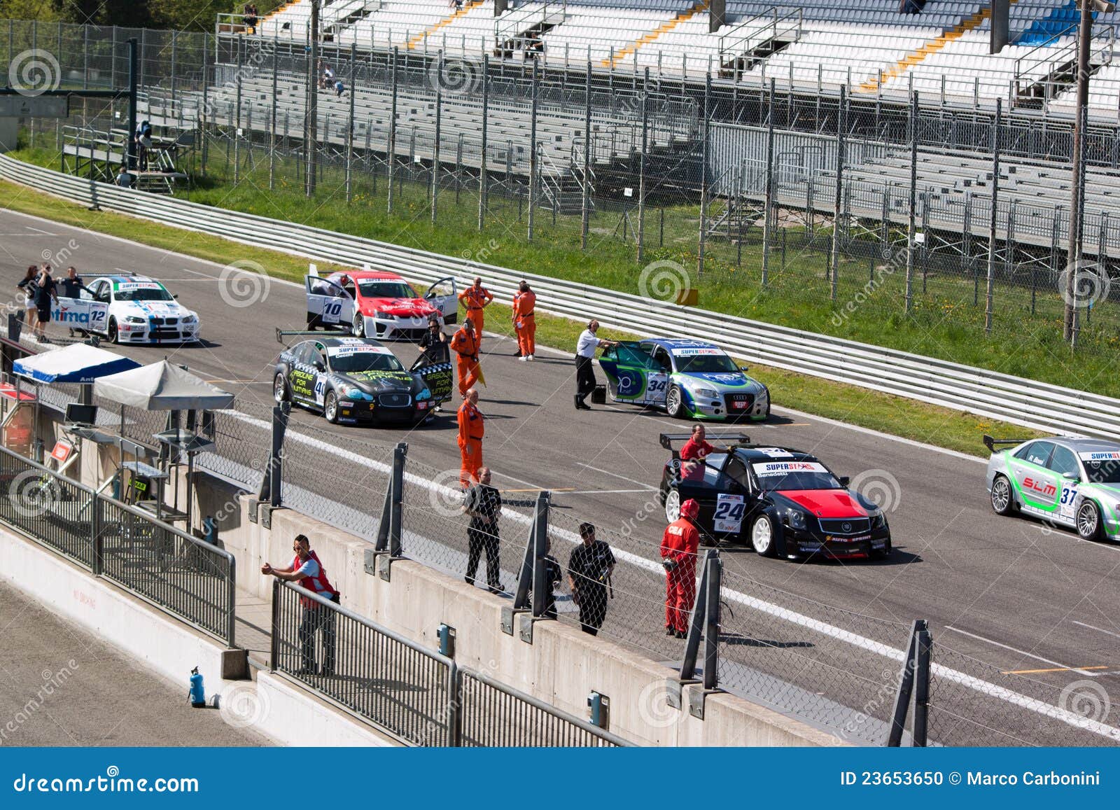 Cars and Technicians on the Grid at Monza Circuit Editorial Image ...