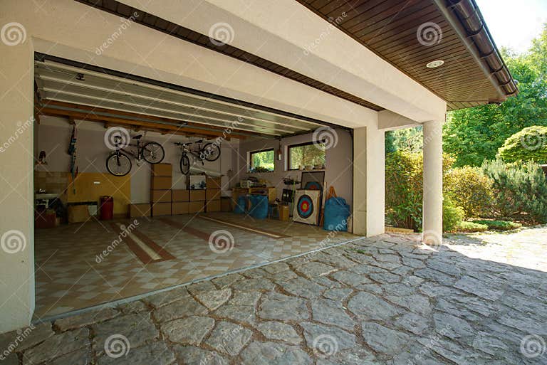 Carton boxes in the garage stock photo. Image of horizontal - 56425012
