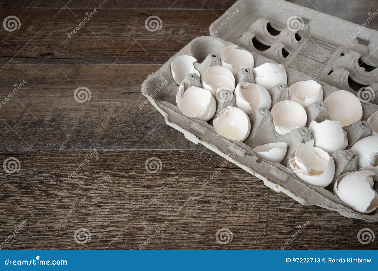 Carton of Broken Egg Shells on Wood Plank Board Stock Image - Image of ...