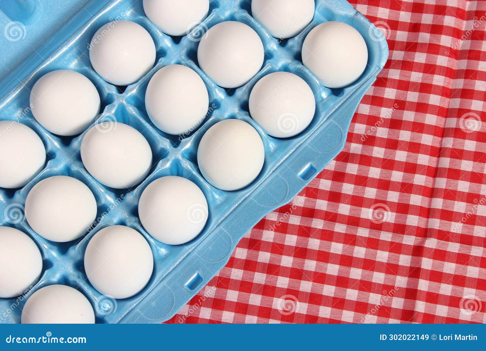 Carton of Eggs on Rustic Table with Checkered Table Cloth Stock Image ...