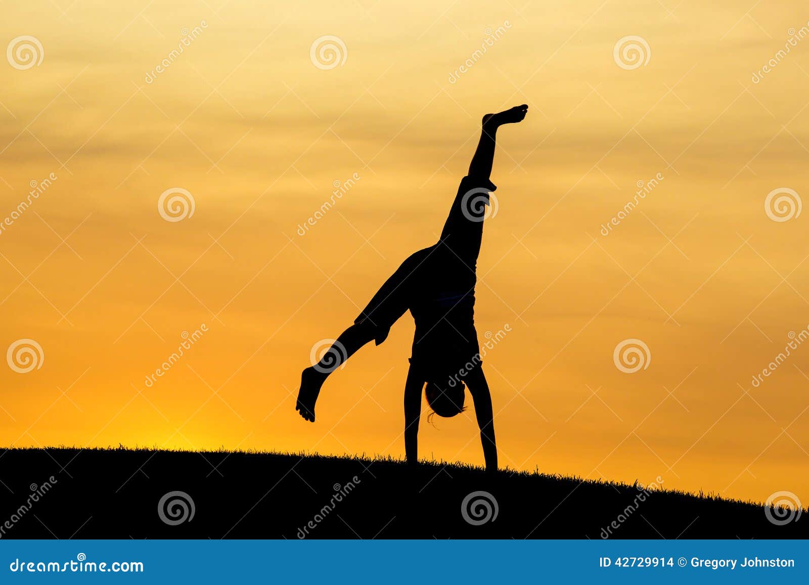 Cartwheel at sunset. stock photo. Image of feelgood, freedom - 42729914