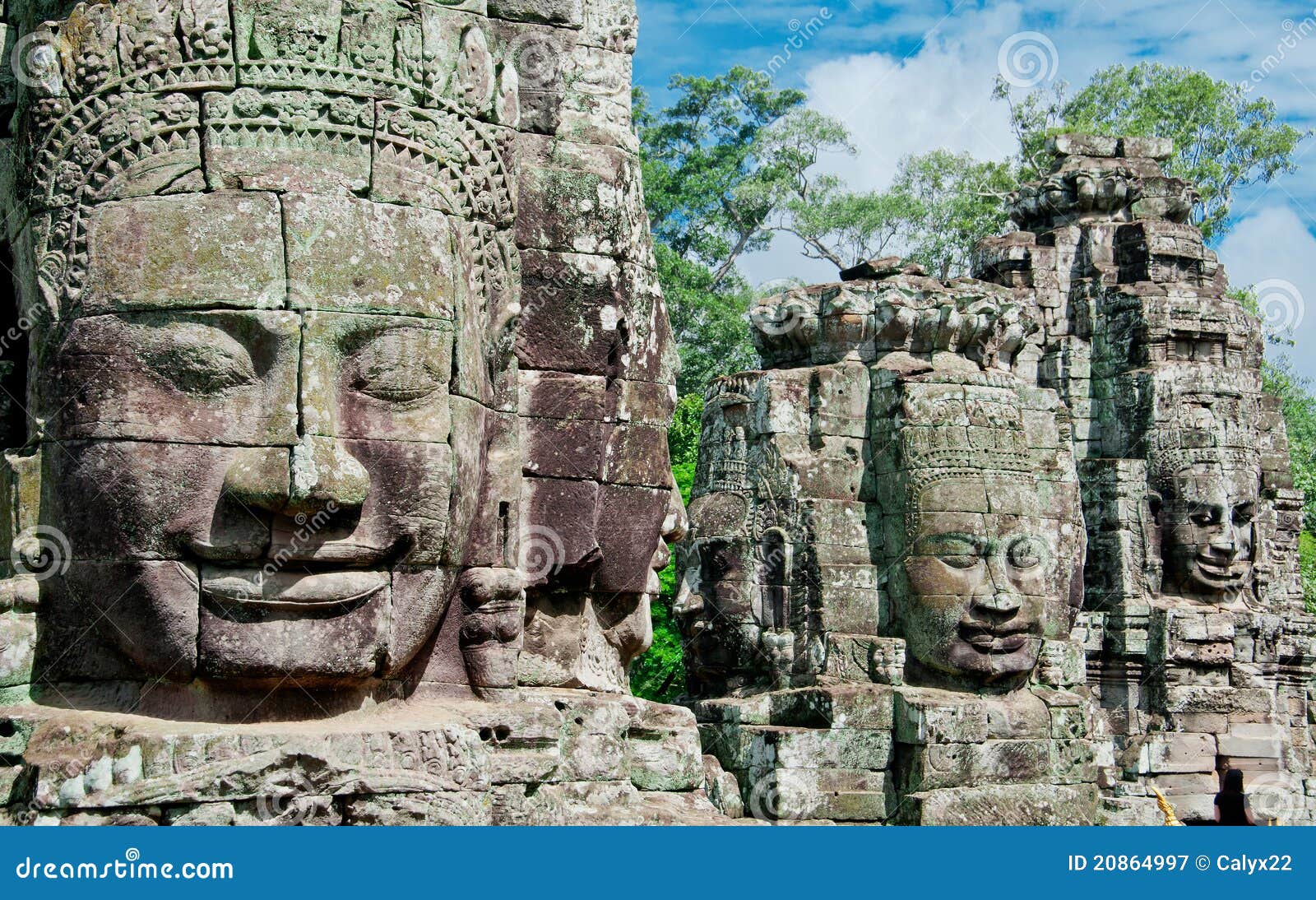 Carved Faces of Angkor stock image. Image of ruin, bayon - 20864997