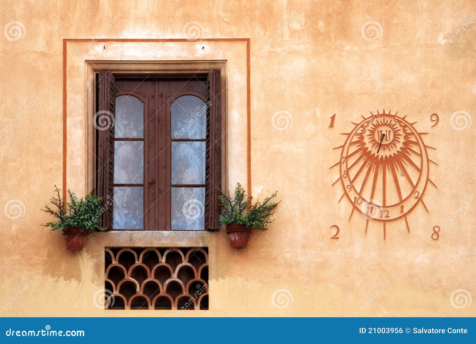 Carved sundial by window stock photo. Image of decorative - 21003956