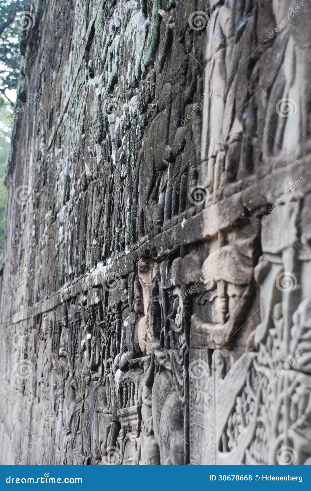 Carved wall at Angkor Wat stock photo. Image of ancient - 30670668