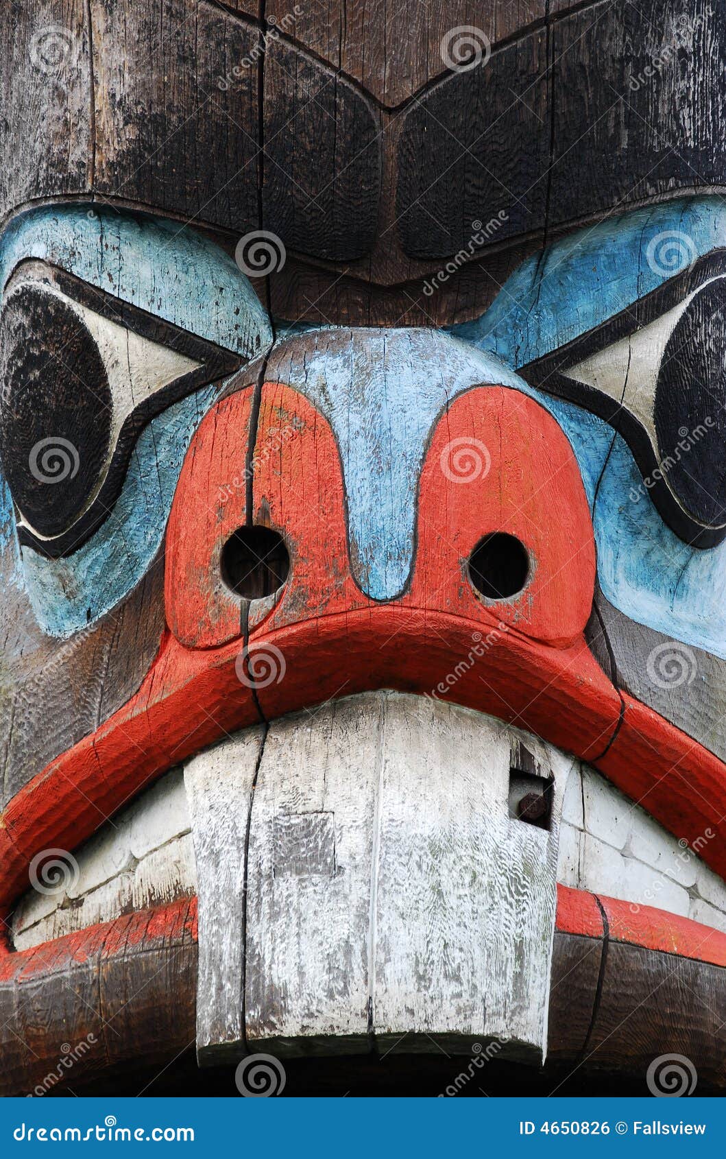Carving Face on a Totem Pole Stock Photo - Image of savage, carving ...
