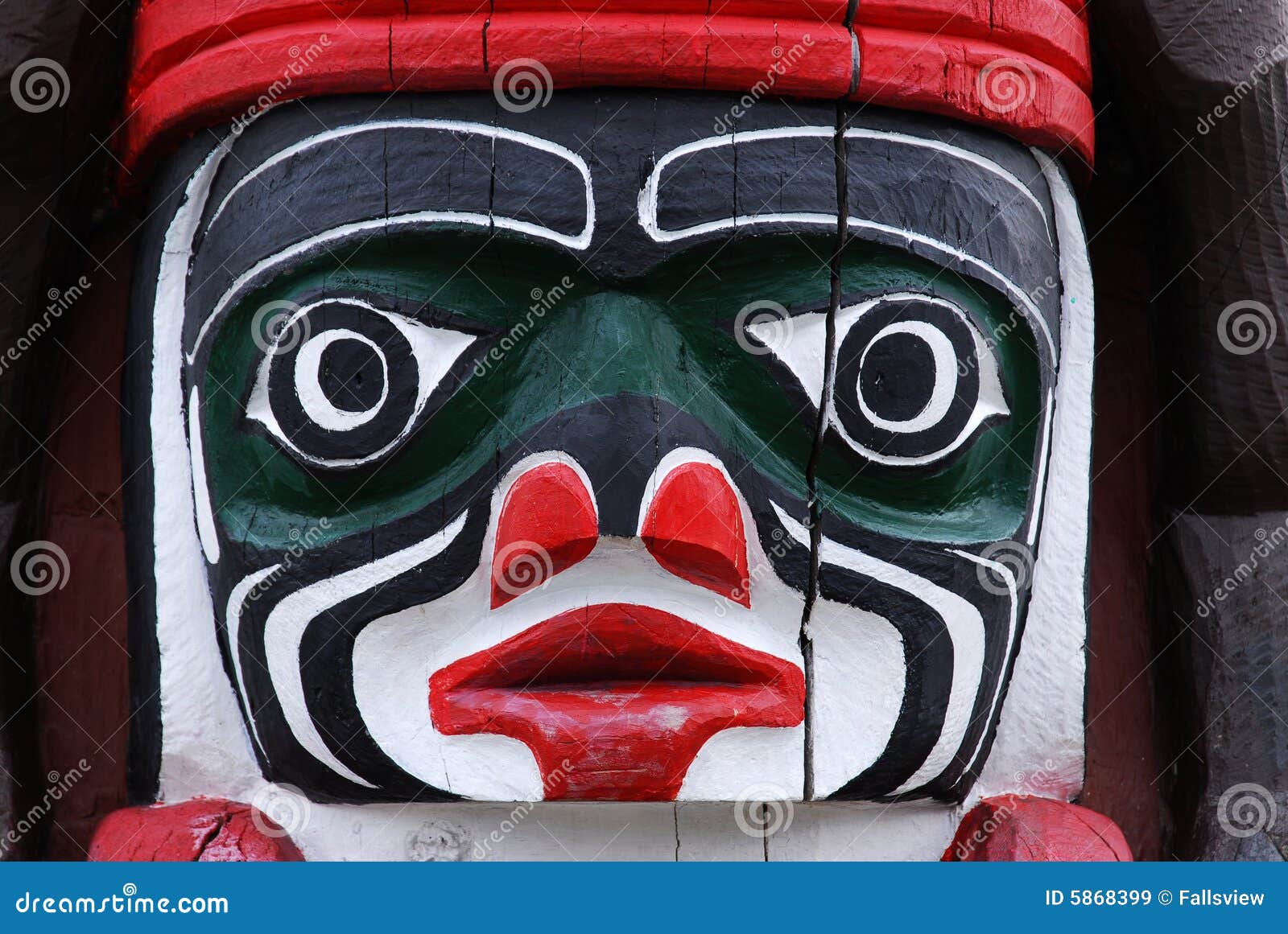 Carving Face on a Totem Pole Stock Image - Image of abstract ...