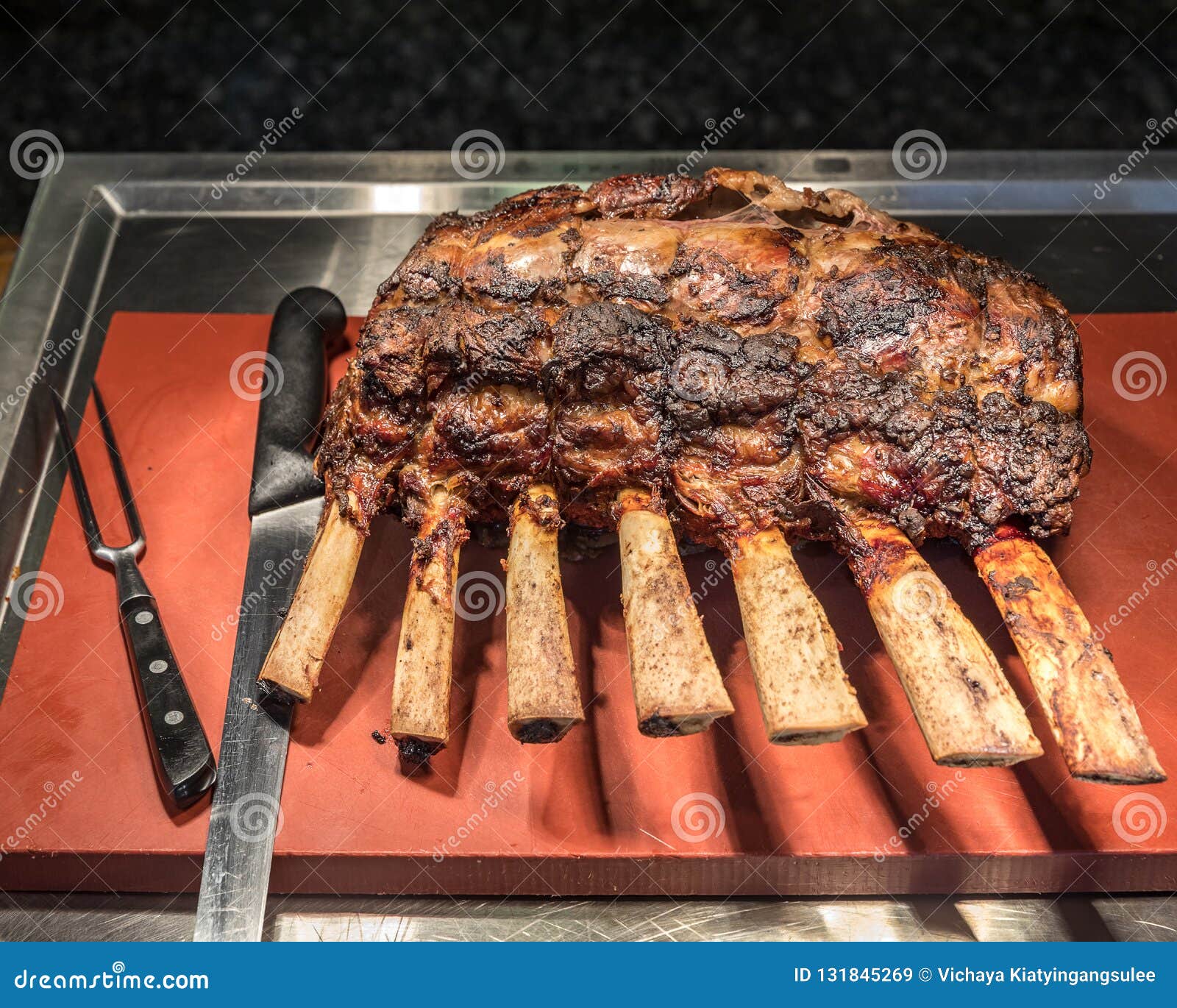 Carving prime rib wagyu stock image. Image of carving - 131845269