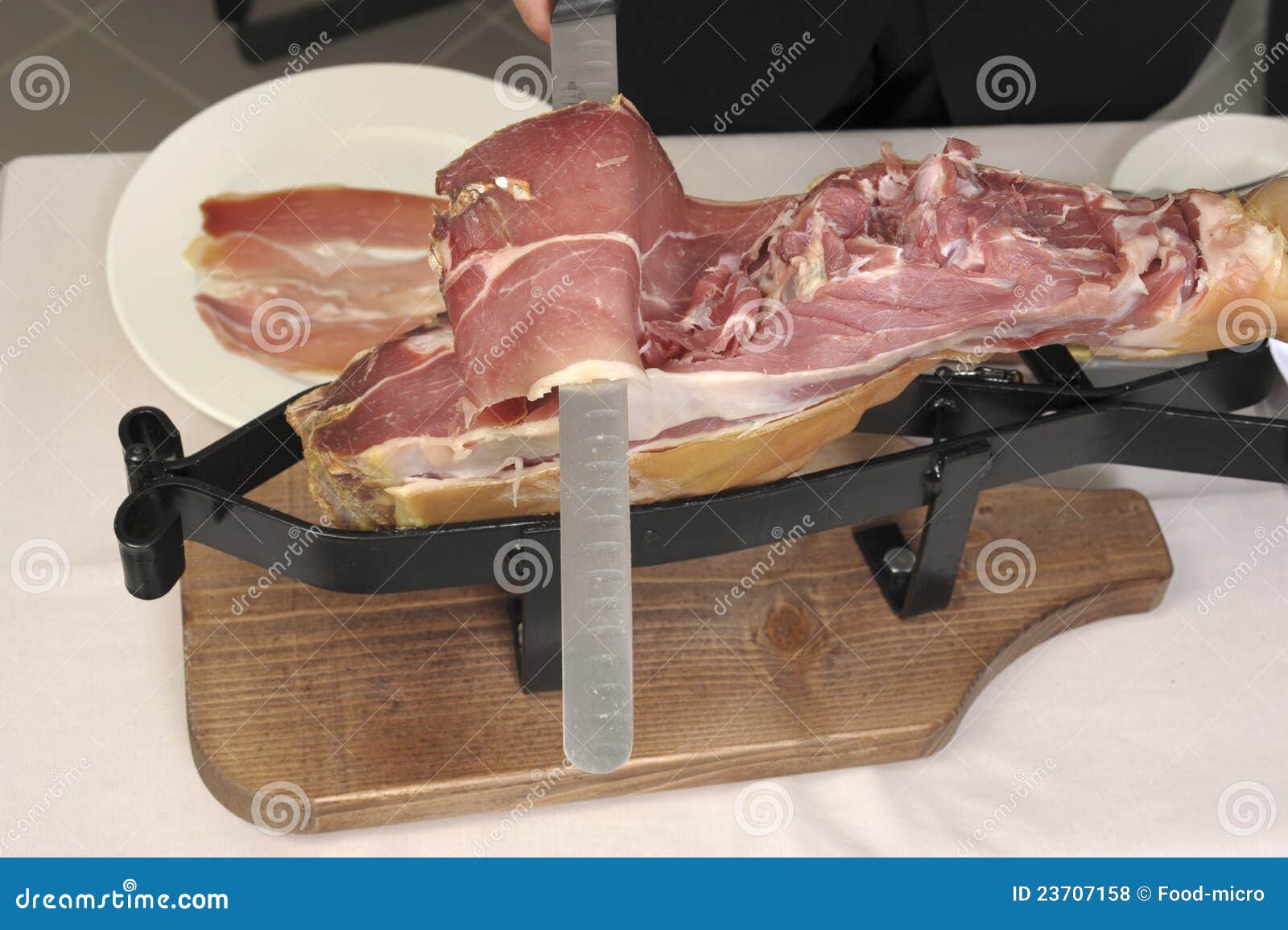 Carving a Raw Ham on a Ham Stand Stock Photo - Image of knife, slice ...