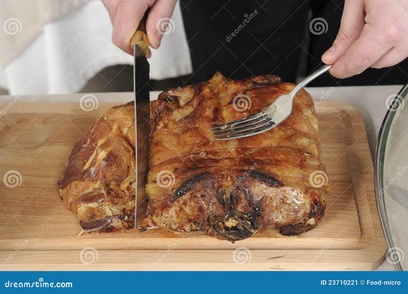 Carving a saddle of lamb stock image. Image of reception - 23710221