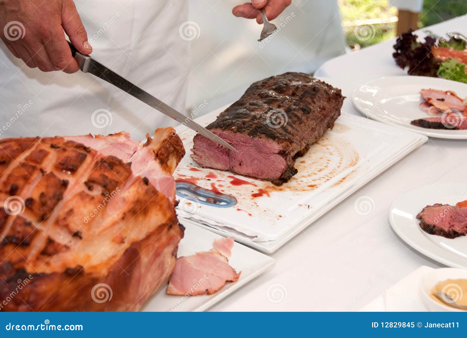 Carving sirloin of beef stock image. Image of plates - 12829845