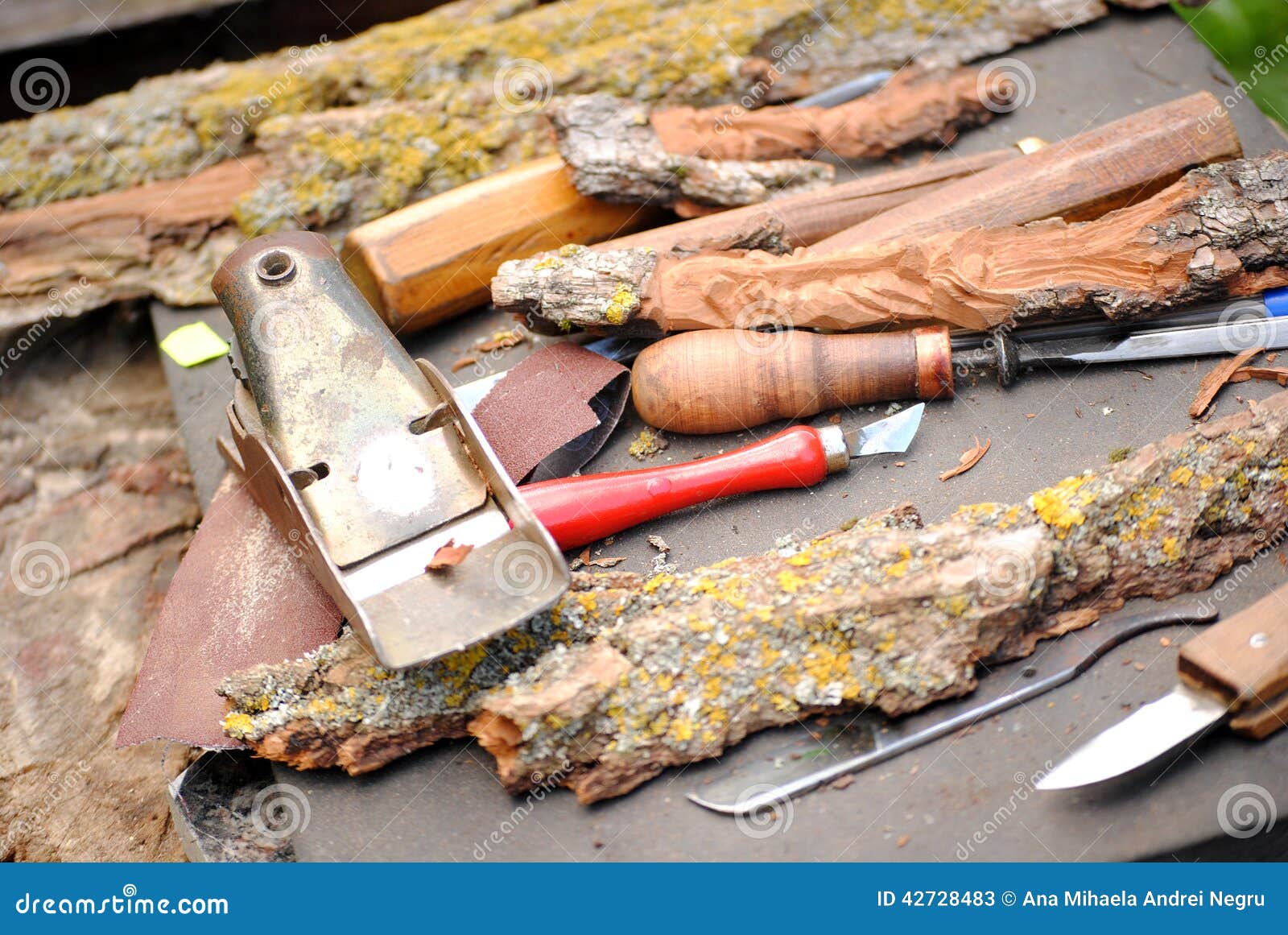 Set Of Carving Tools With Chisels And Hammer On Top Of Wooden Workbench ...