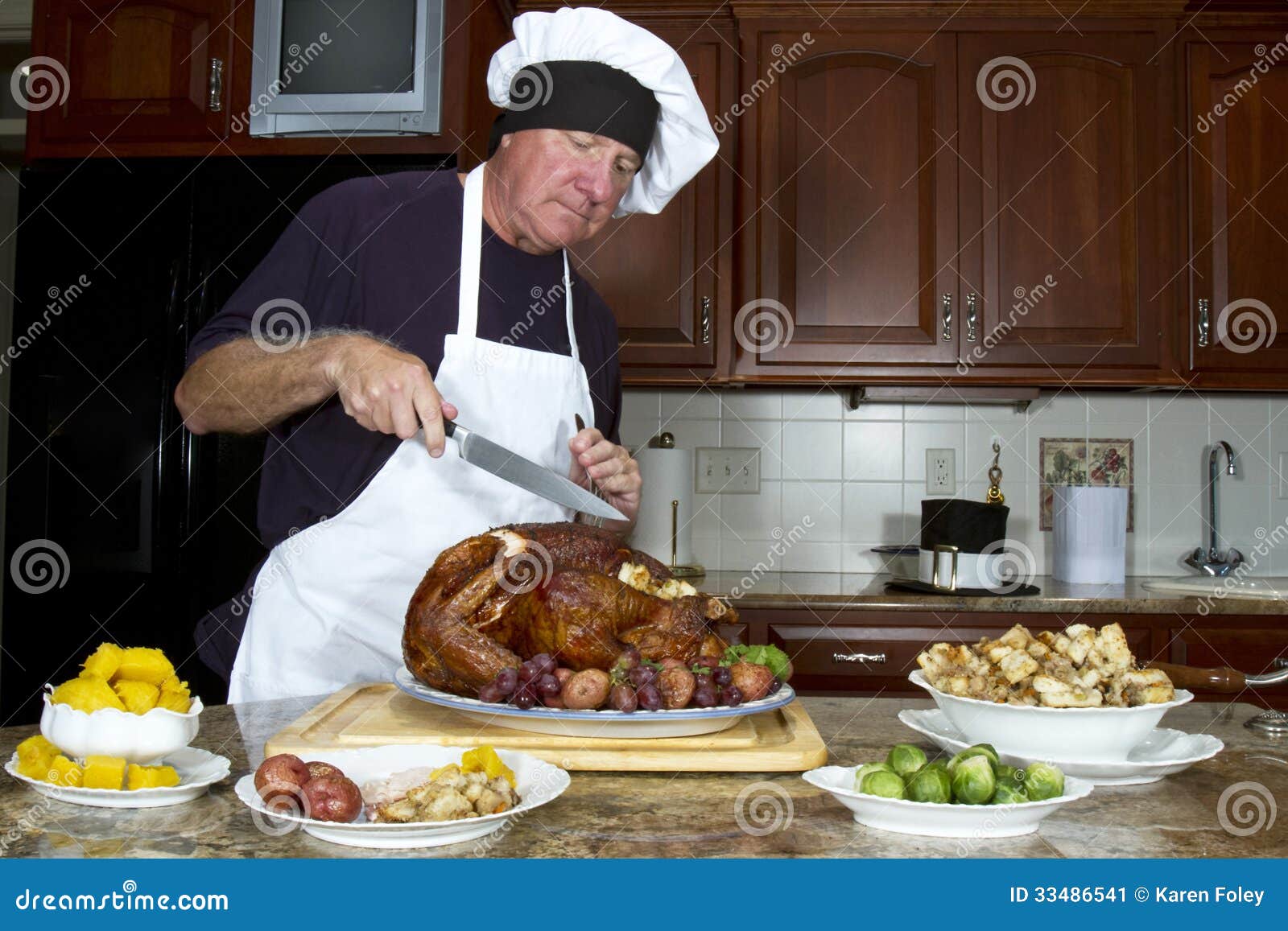 Carving the Turkey stock image. Image of carver, meal - 33486541