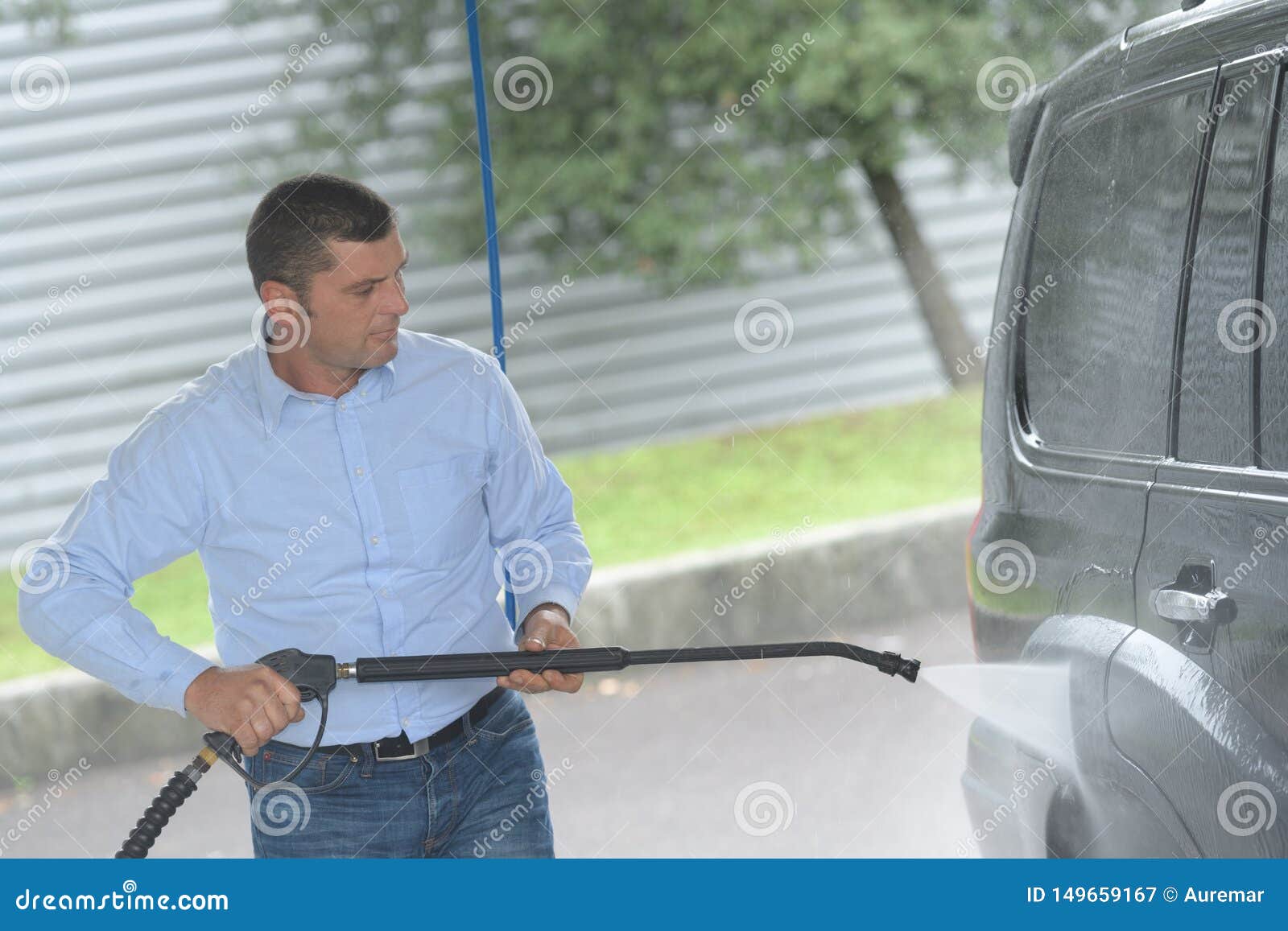 Carwash - Man Working with High Pressure Washer Stock Image - Image of ...