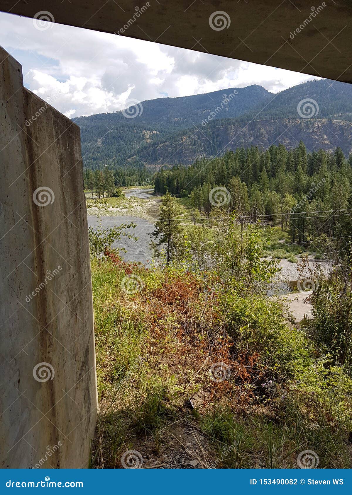 Cascade Falls under Bridge stock photo. Image of cascade - 153490082