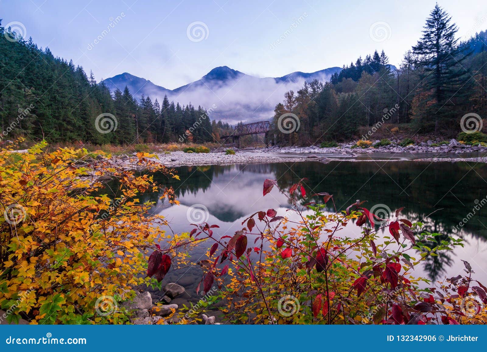 Fall Foliage Skirts the Shore of the Skykomish River, Washington State ...