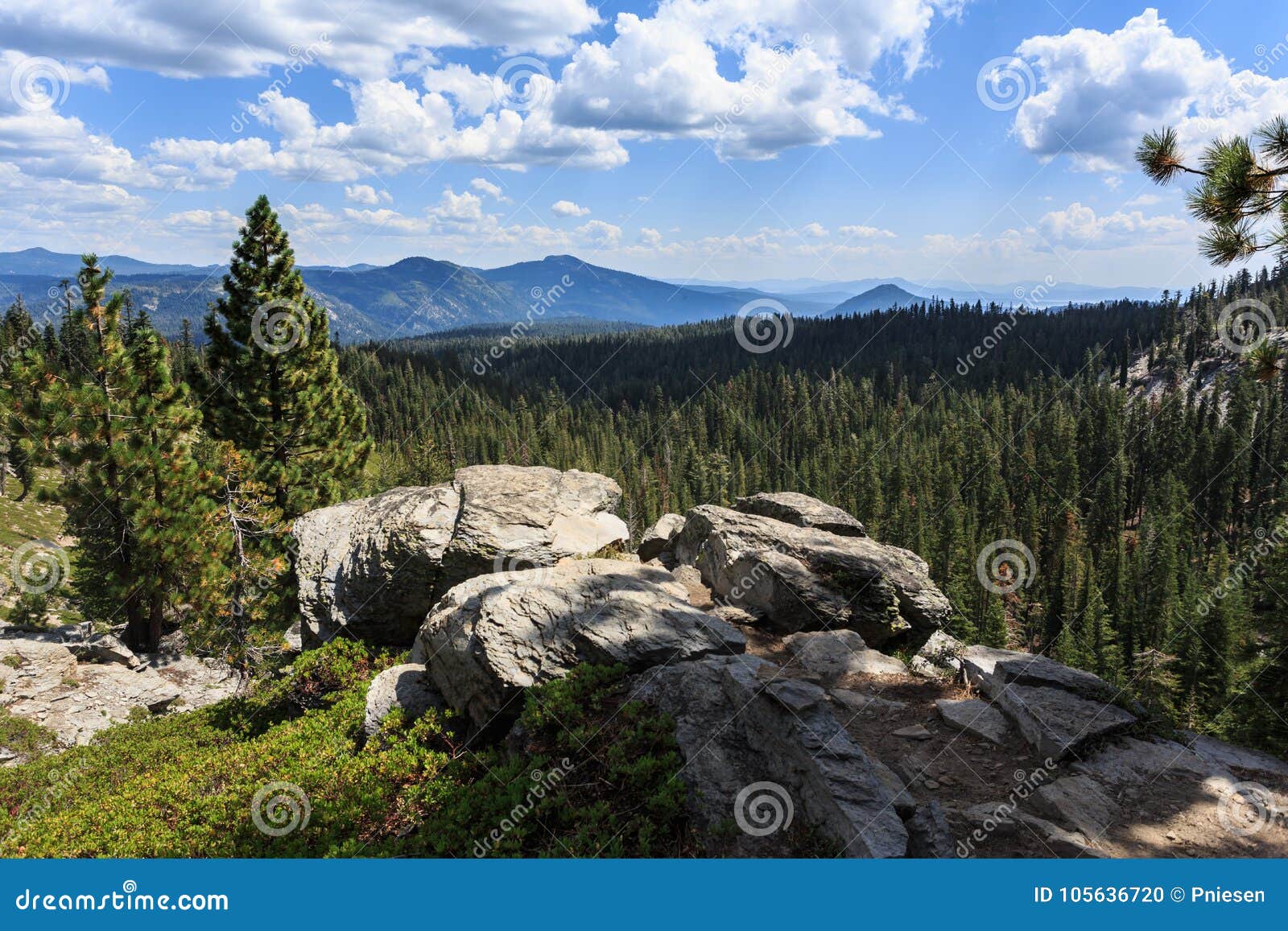 The Cascade Mountains Viewed from Afar on Rugged Rocky Outcrop on a ...