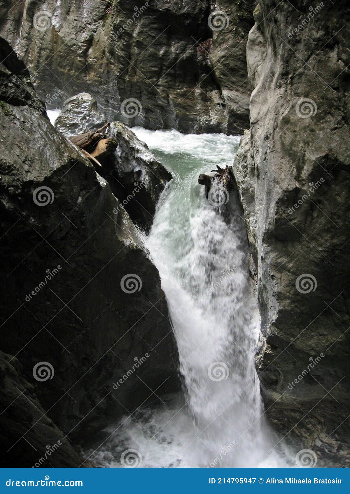 Cascade between rocks. stock image. Image of tourism - 214795947