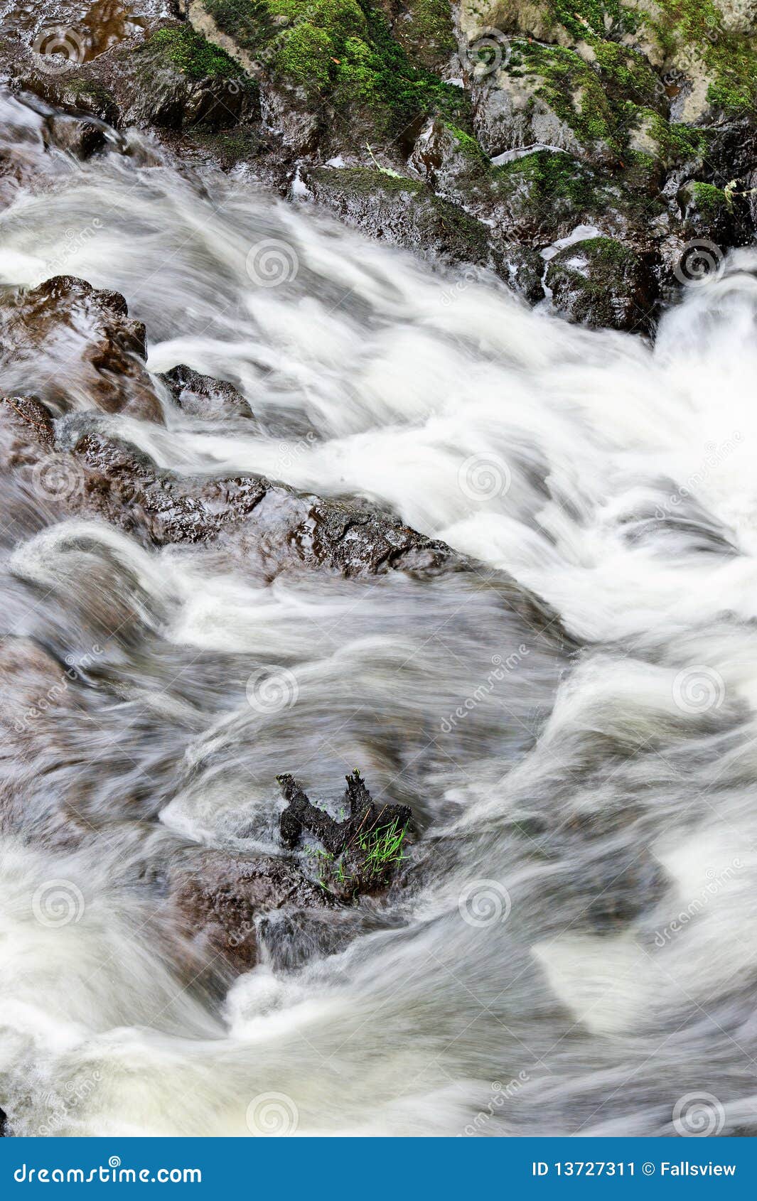 Cascade and stone stock image. Image of lady, grass, landscape - 13727311