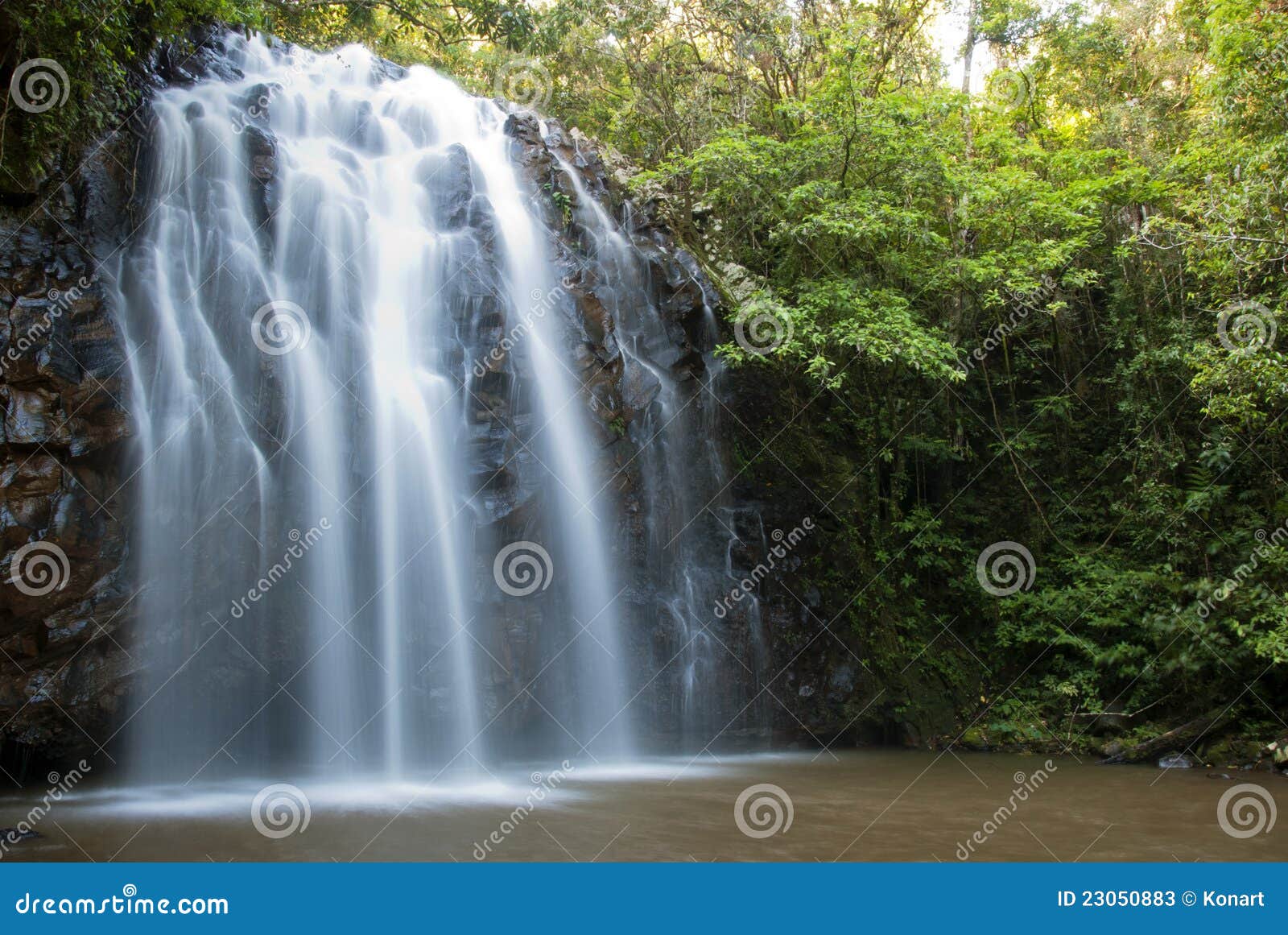 Cascades of Water Flowing Over Rock in Jungle Stock Image - Image of ...