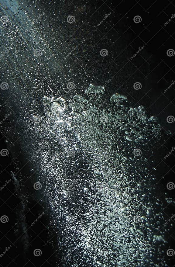 Cascading Rising Burst of Bubbles - Shaft of Light Stock Photo - Image ...