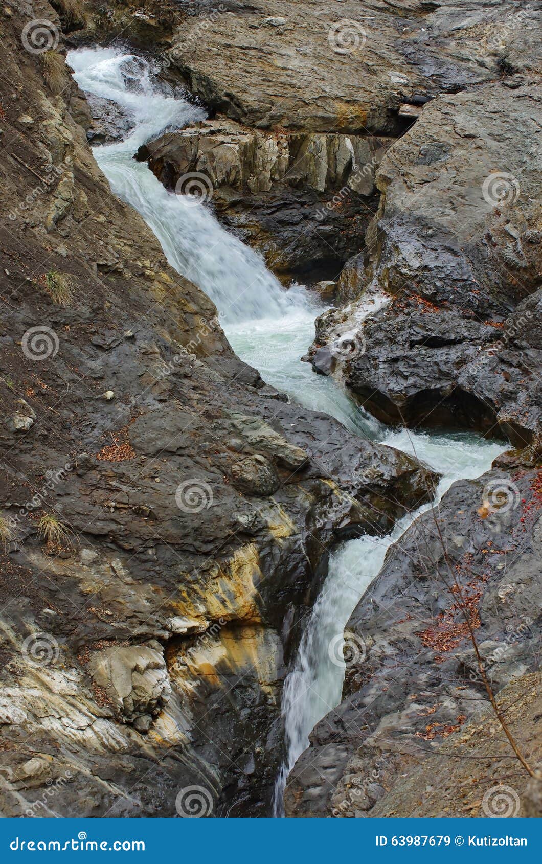Cascading Stream between Rocks 2 Stock Image - Image of blur, mountains ...