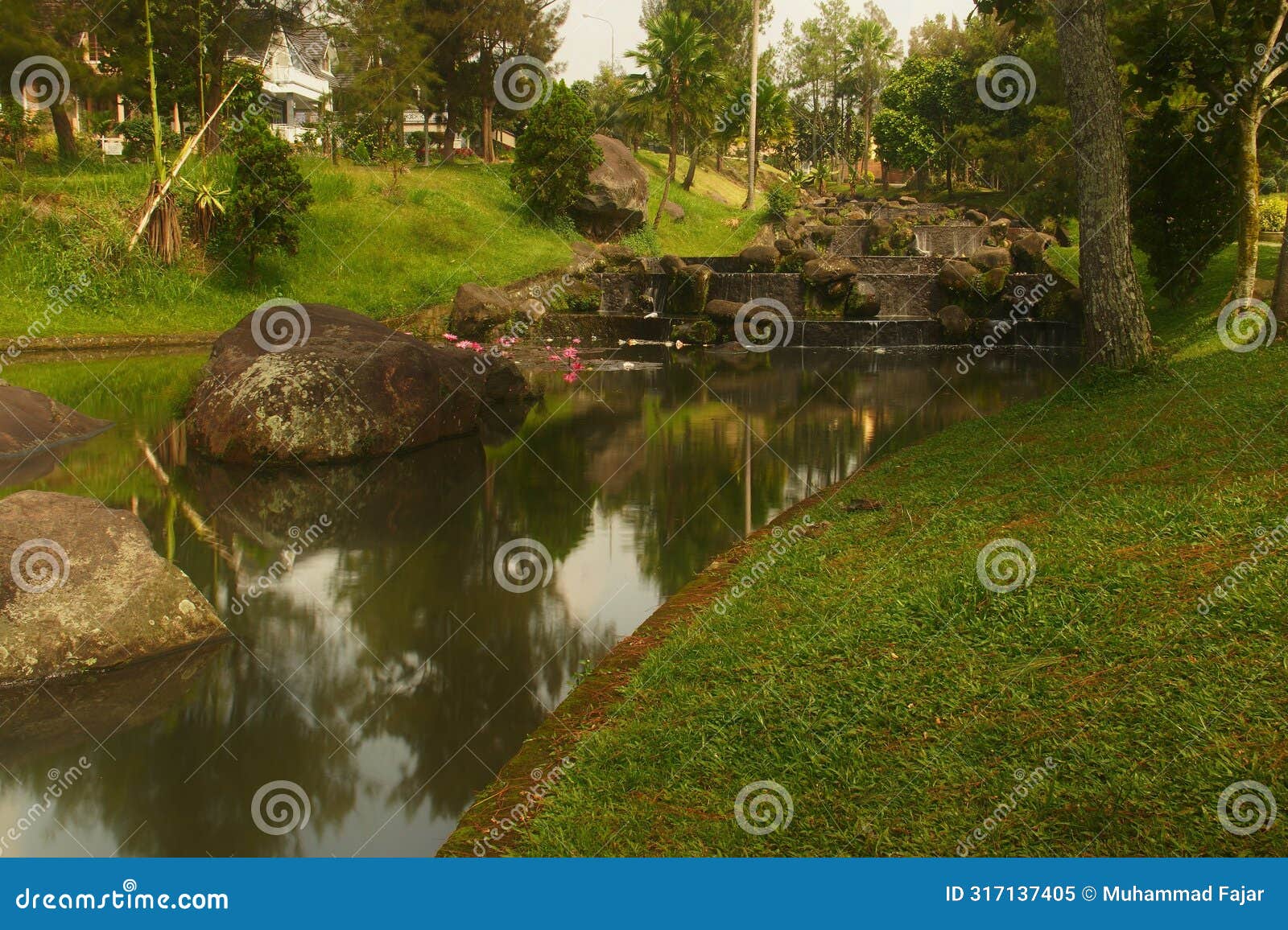 Cascading Waterfall in a Park of a Housing Complex Stock Image - Image ...