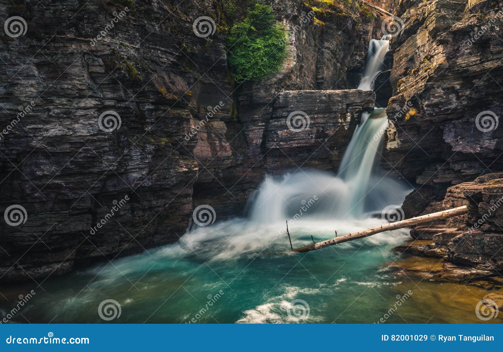 Cascading Waterfalls Flowing into a River. Stock Image - Image of green ...