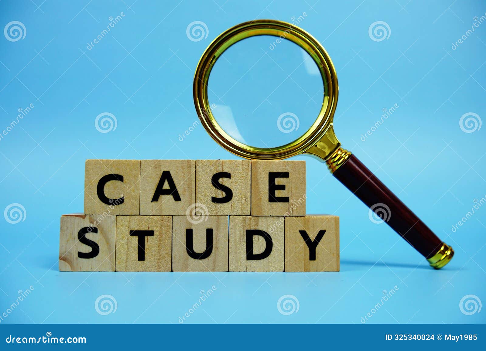 Case Study with Wooden Blocks Alphabet Letters and Magnifying Glass on ...