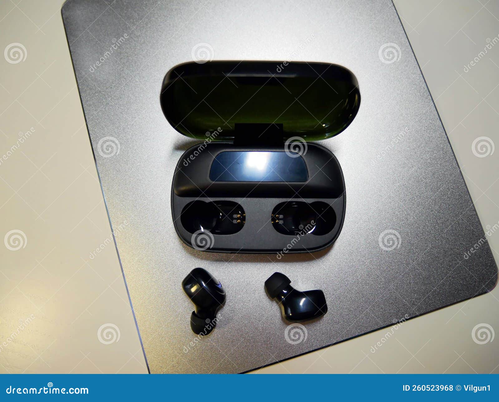 The Case of TWS Headphones is Made of Black. Black Wireless Headphones ...