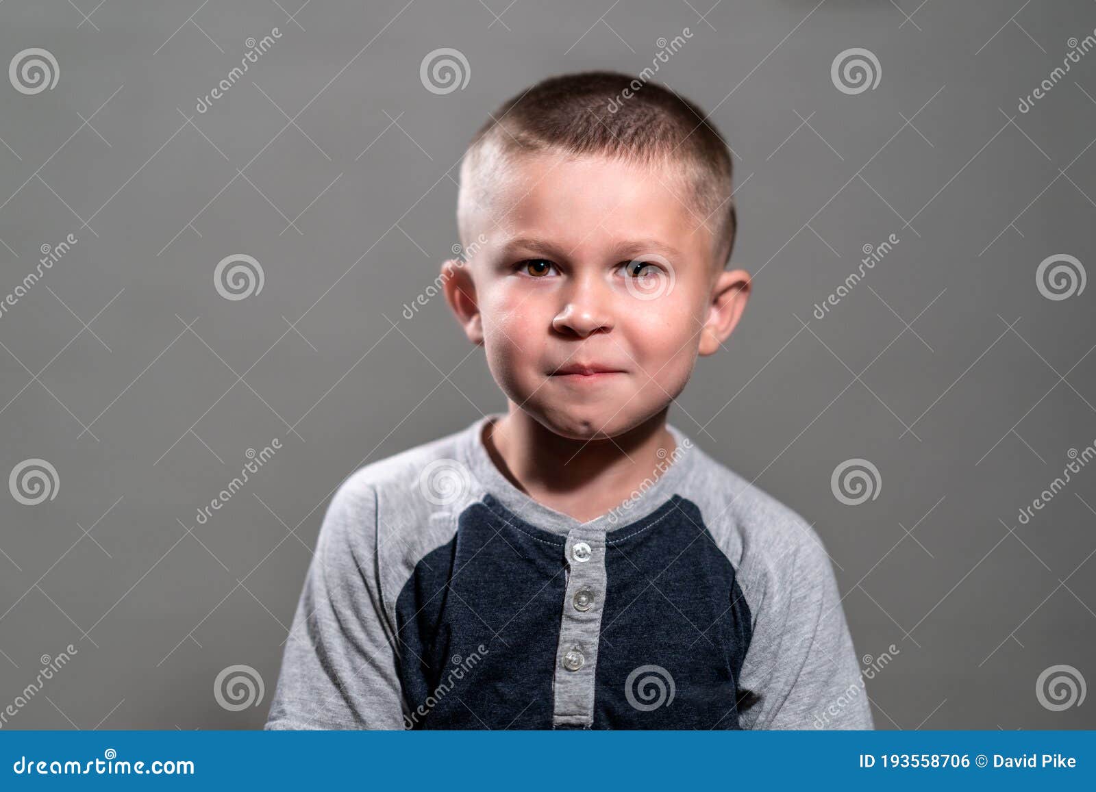A Child Male Model, Looking at Camera, Concerned Stock Photo - Image of ...