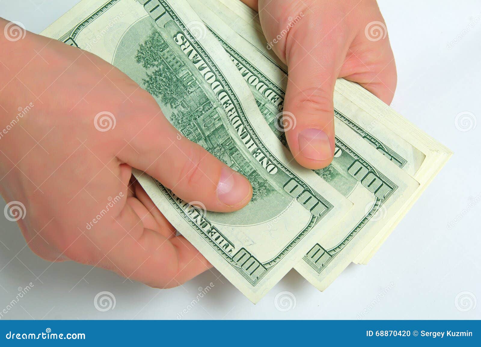 Cash US dollars in hand. stock photo. Image of profitability - 68870420