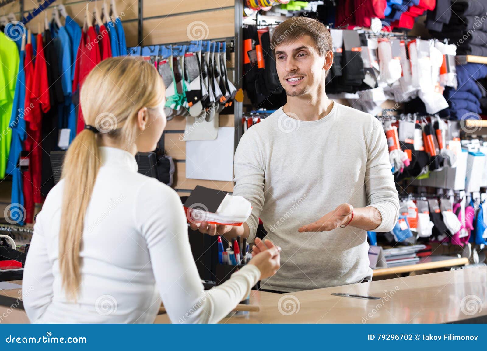 Cashier Helping Customer at the Pay Desk Stock Photo - Image of helping ...