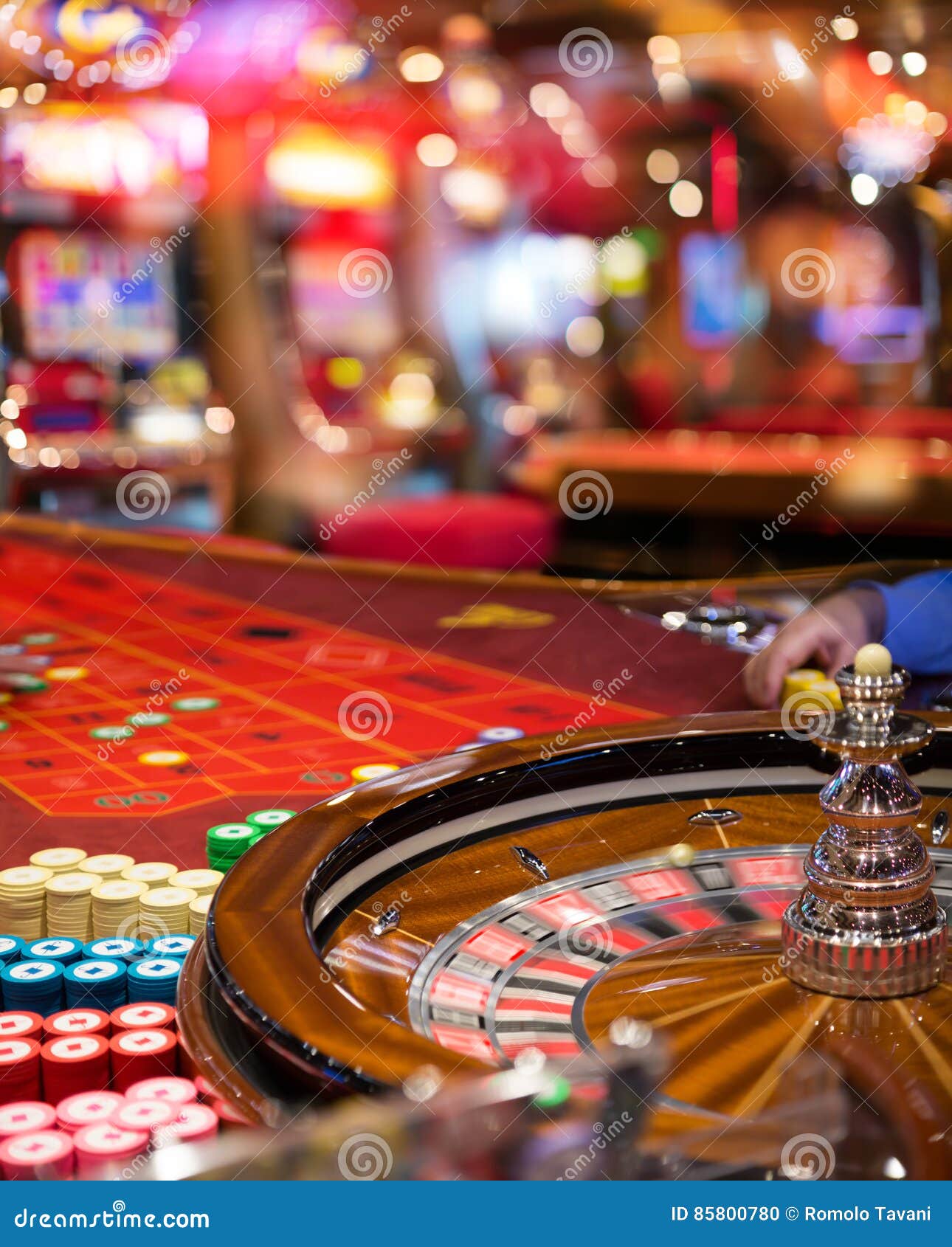 Casino - Roulette in Motion with Blurred Slot Stock Photo - Image of ...