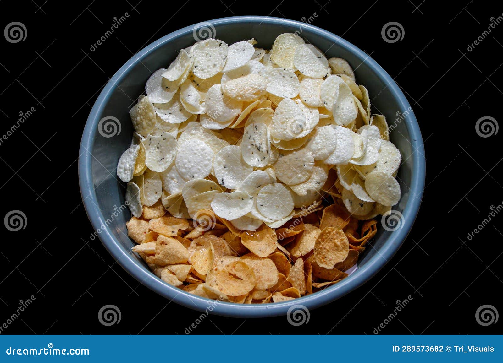 Cassava Chips in a Plastic Container Isolated on Black Background with ...