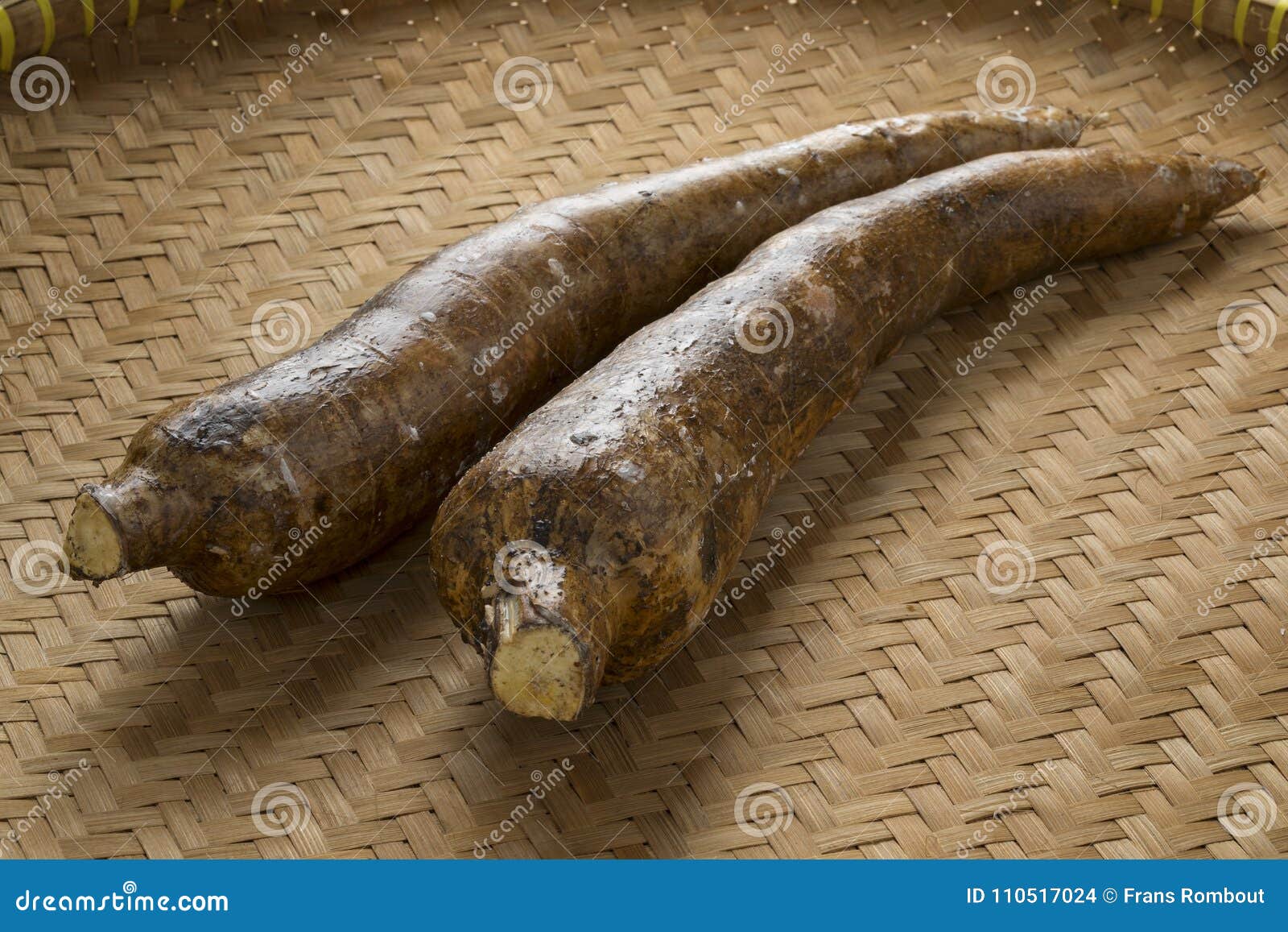 Cassava roots on a basket stock photo. Image of ingredient - 110517024