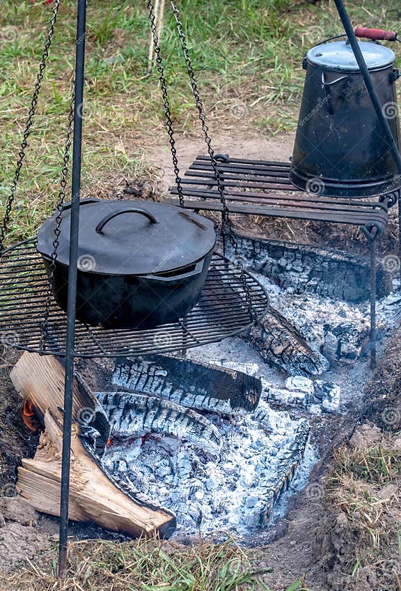Cast Iron Cooking Over a a Camp Fire Stock Image - Image of travel ...