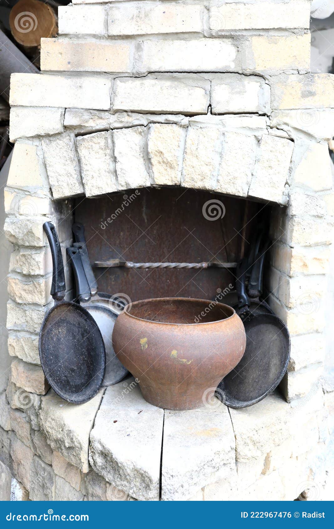 Cast Iron Cookware in Stone Oven Stock Photo - Image of abstract, clay ...