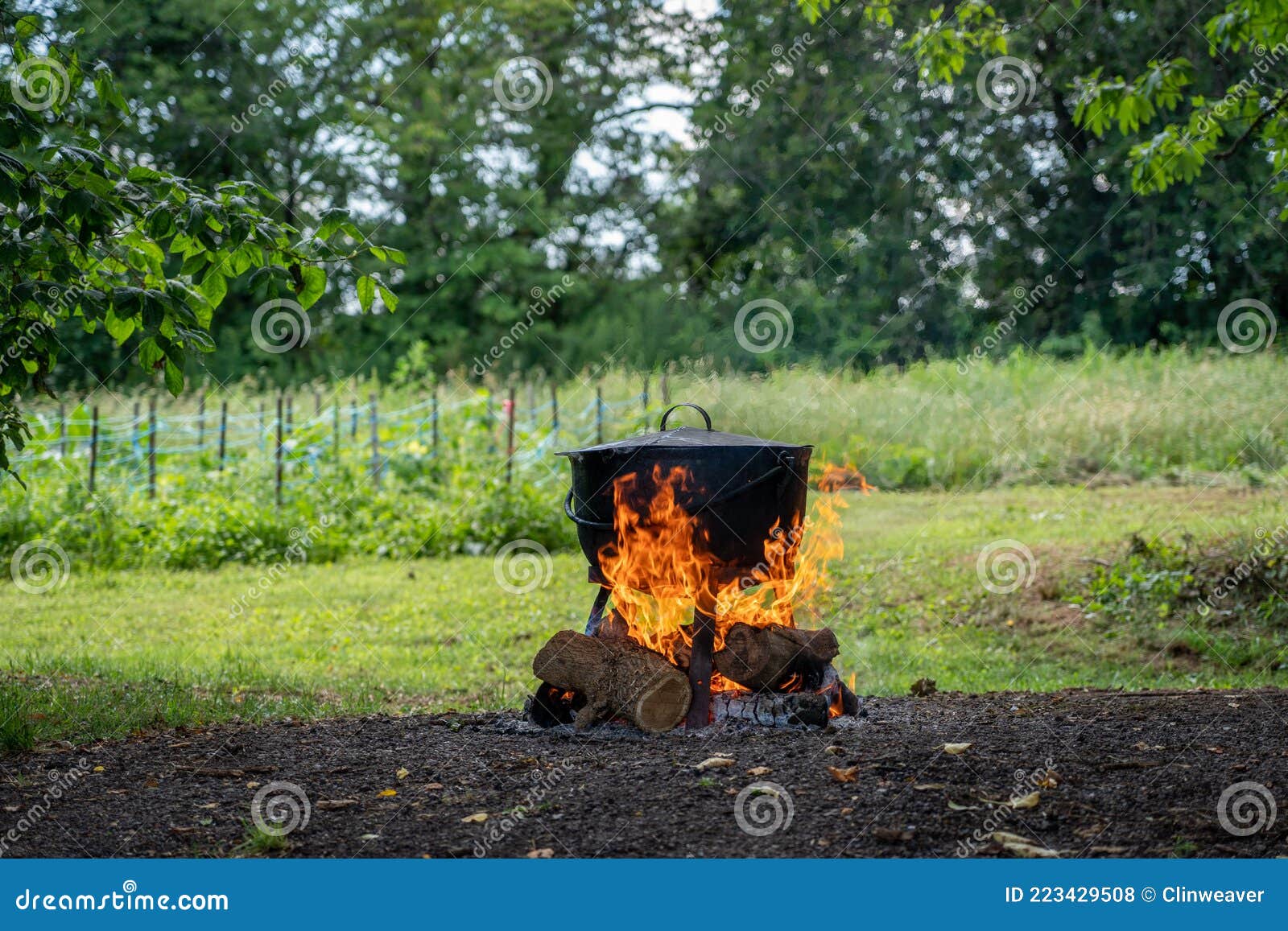 Cast Iron Kettle over Fire stock photo. Image of cast - 223429508