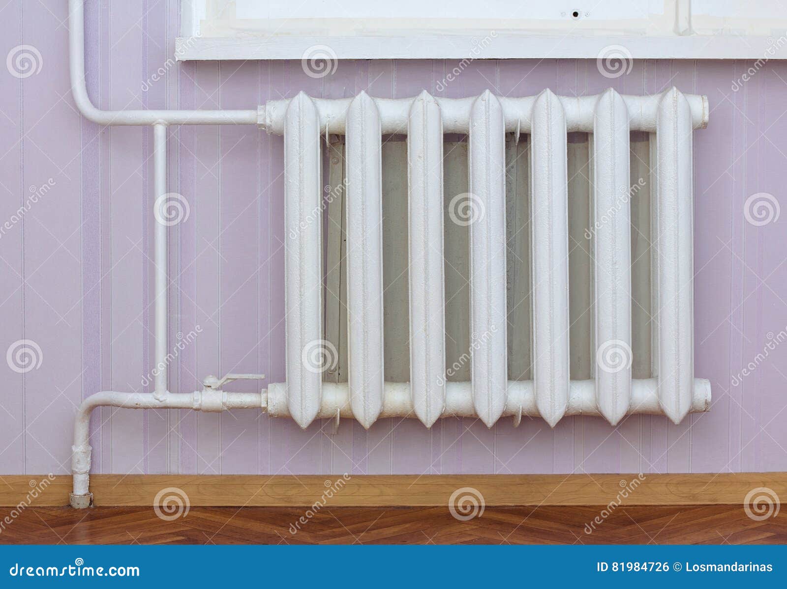 Cast iron radiator at home stock photo. Image of wall - 81984726
