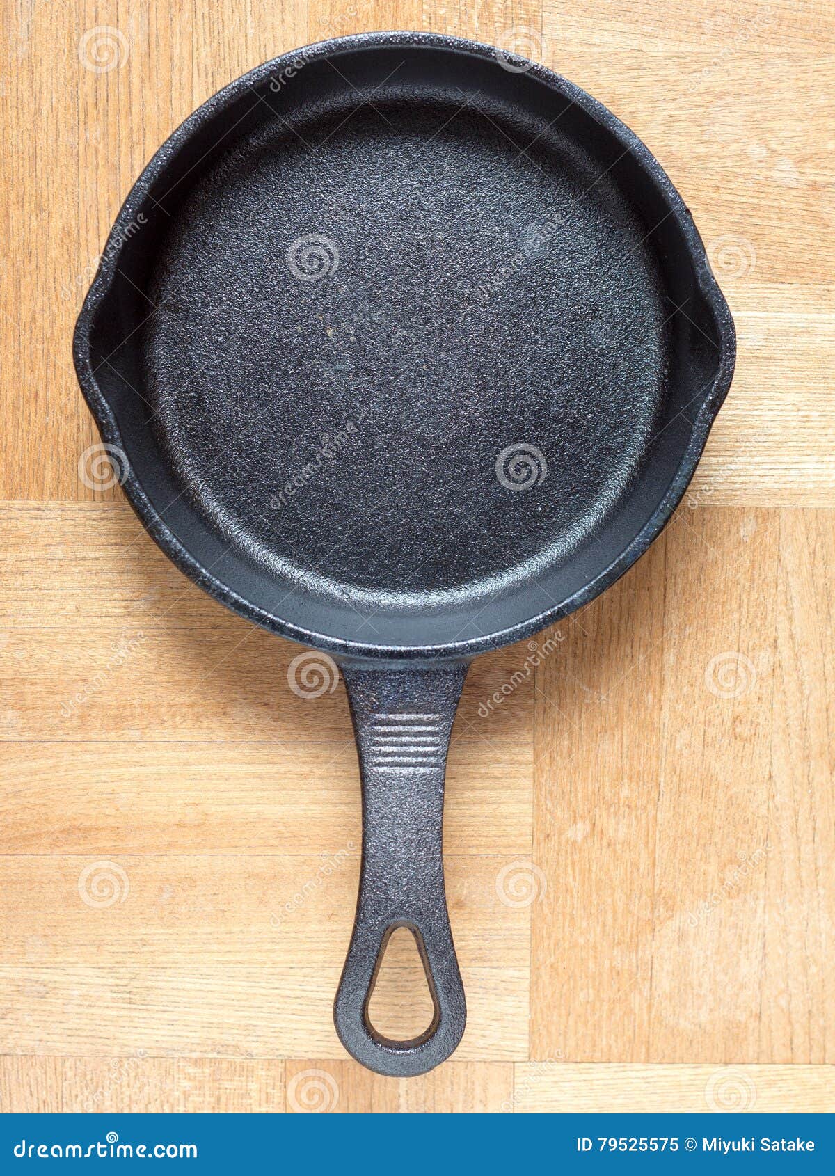 Cast Iron Skillet on Wooden Table Stock Image - Image of frying, white ...