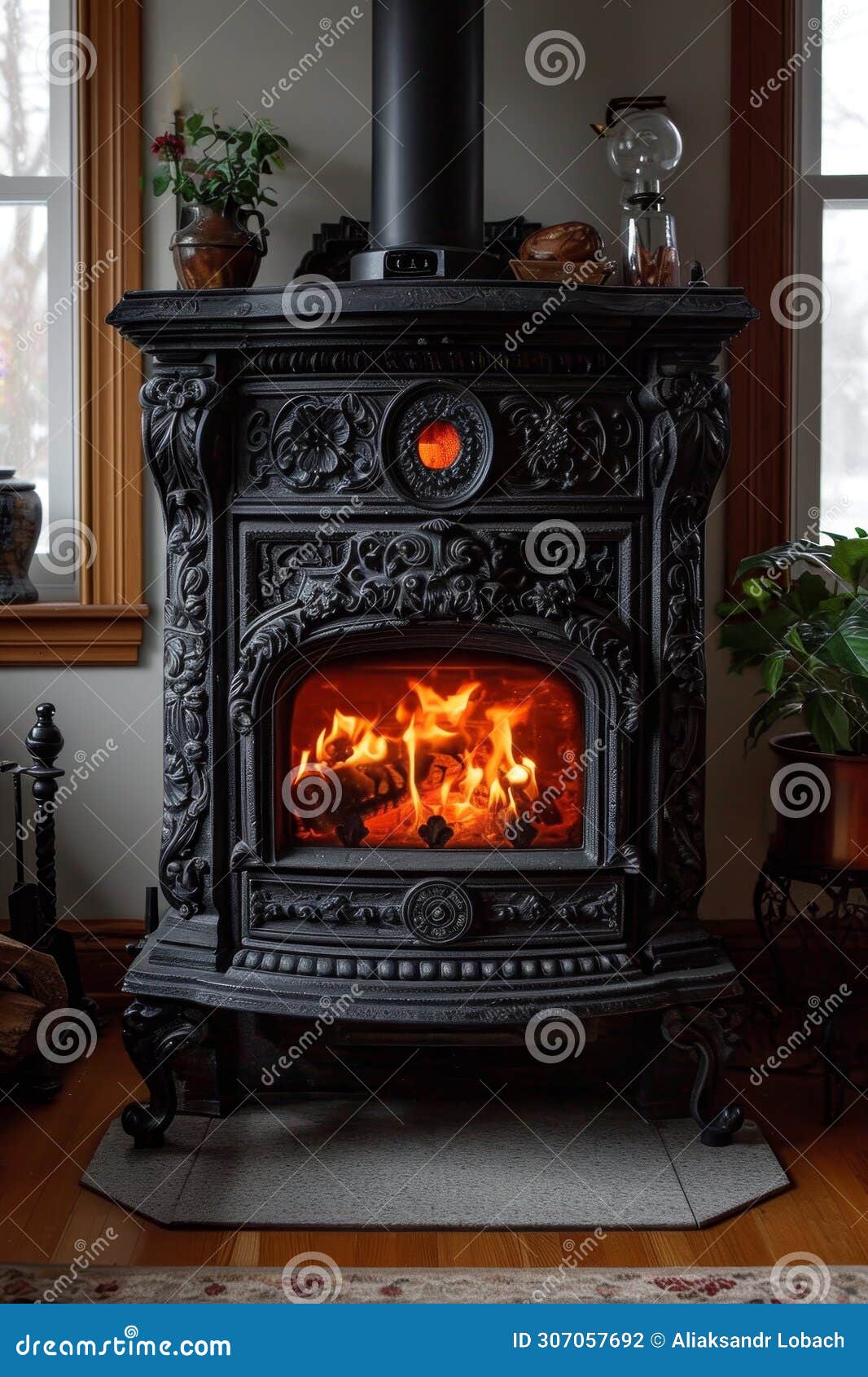 Cast-iron Stove in a Rustic House with a Fire Lit Inside To Heat the ...
