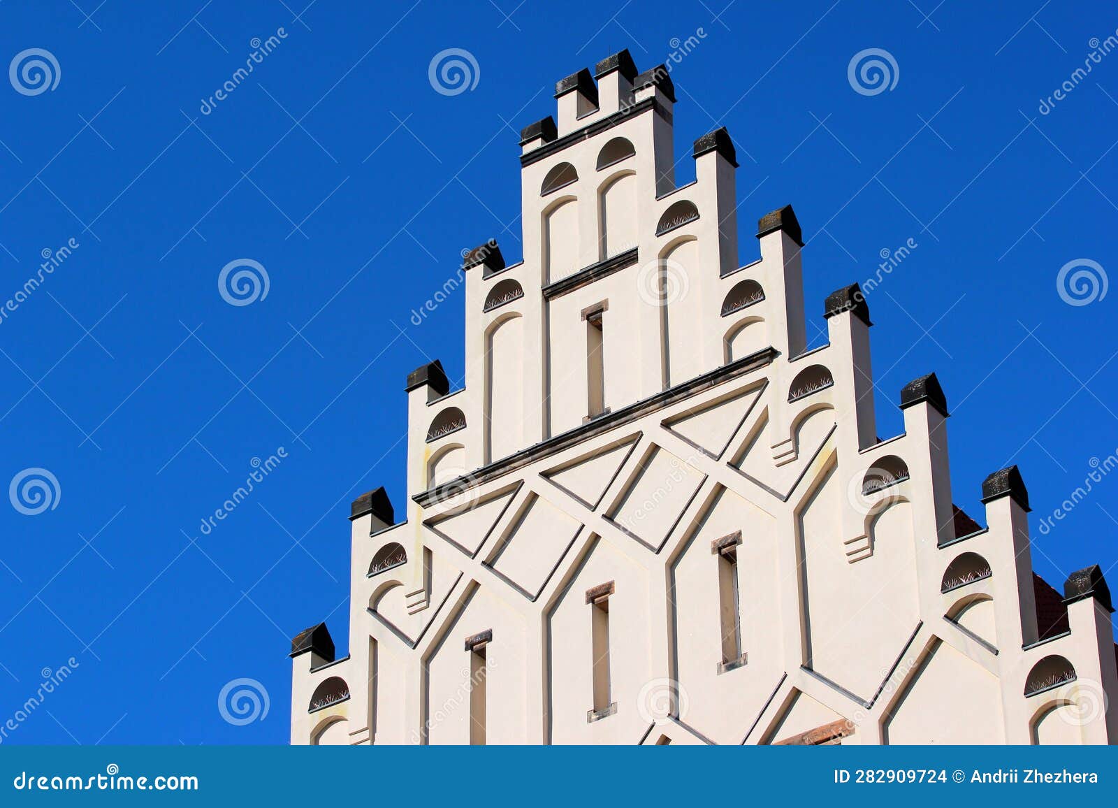 Castellation Walls and Turrets on a Rooftop Against the Blue Sky ...