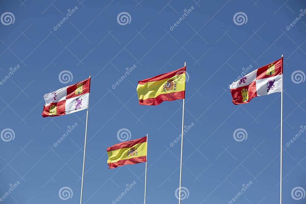 Castile and Leon and Spanish Flags Stock Photo - Image of spanish, pole ...