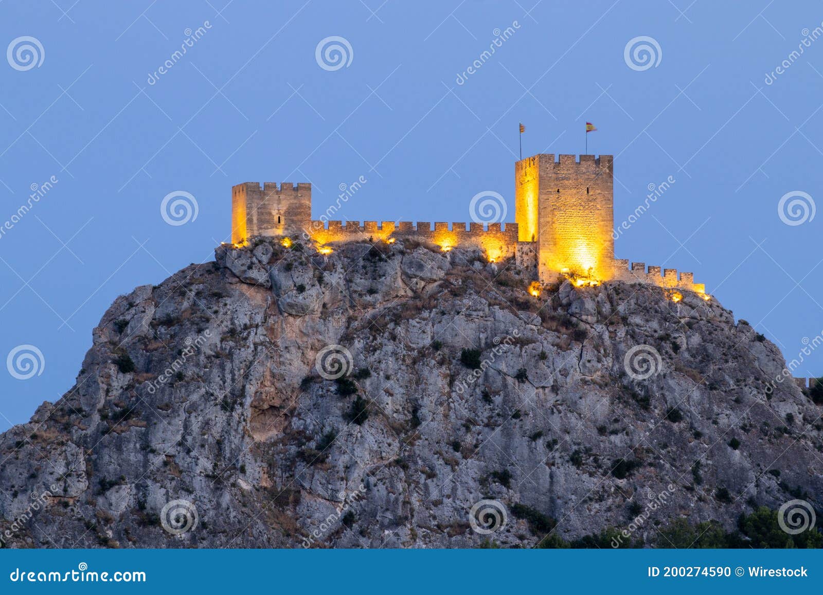 Castillo De Sax on Rocks Surrounded by Lights in the Evening in Spain ...