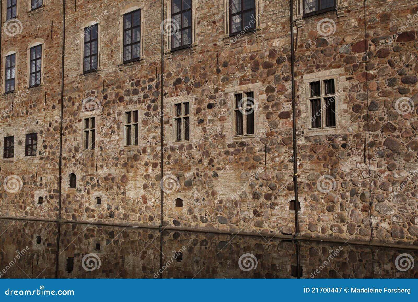 Castle Facade Over Rocky Hill On Square With Pillory Royalty-Free Stock ...