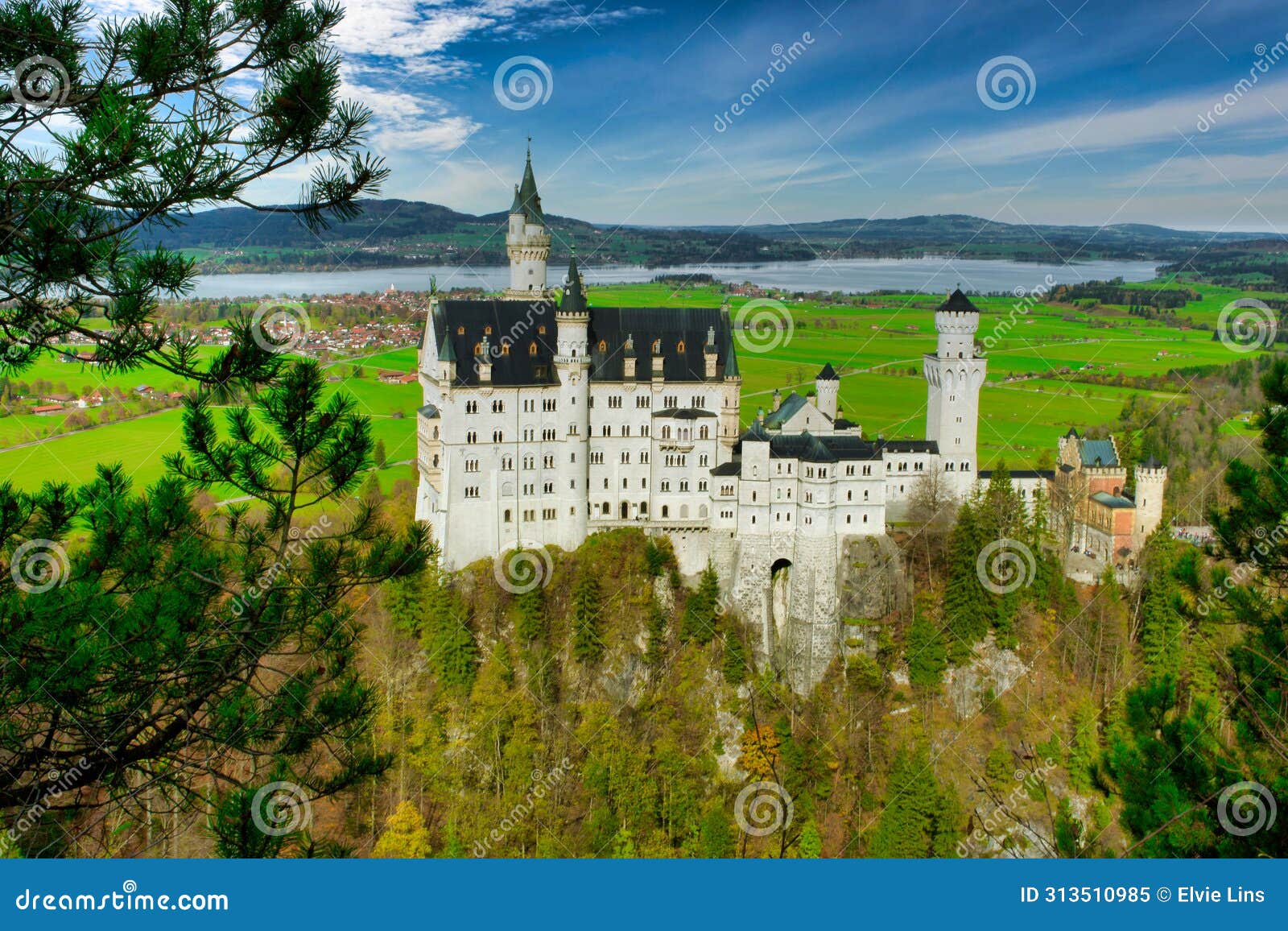 A Castle with a Large Tower and a Green Hillside Editorial Image ...