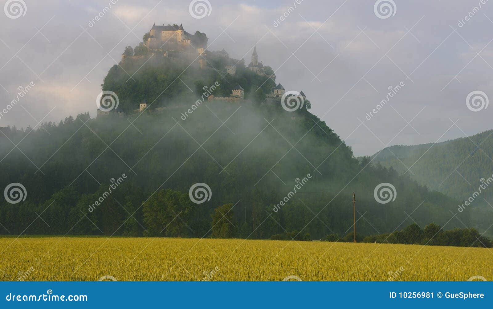 Castle in Morning Mist stock image. Image of hochosterwitz - 10256981