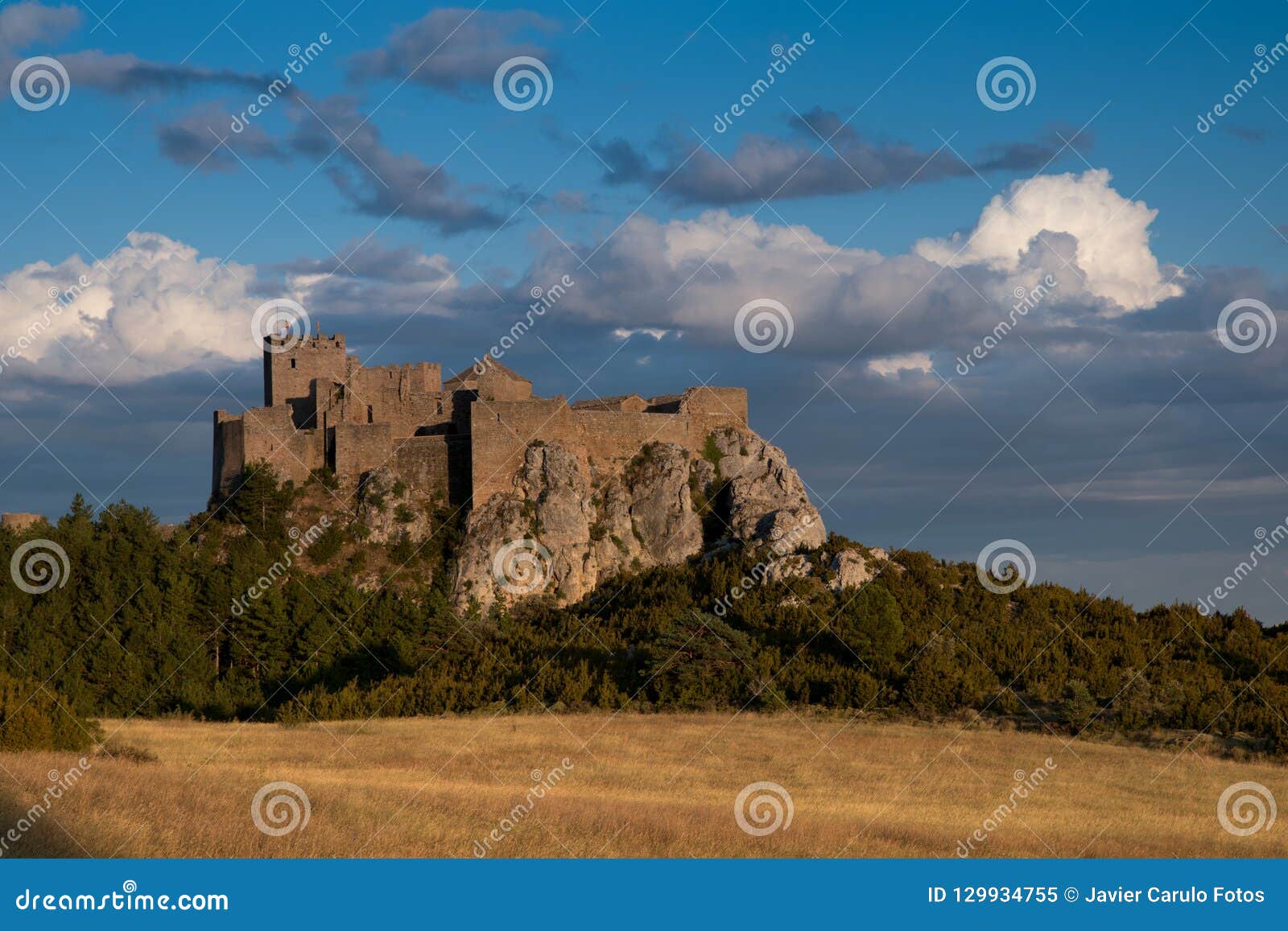 Castle on a mountain stock image. Image of landmark - 129934755